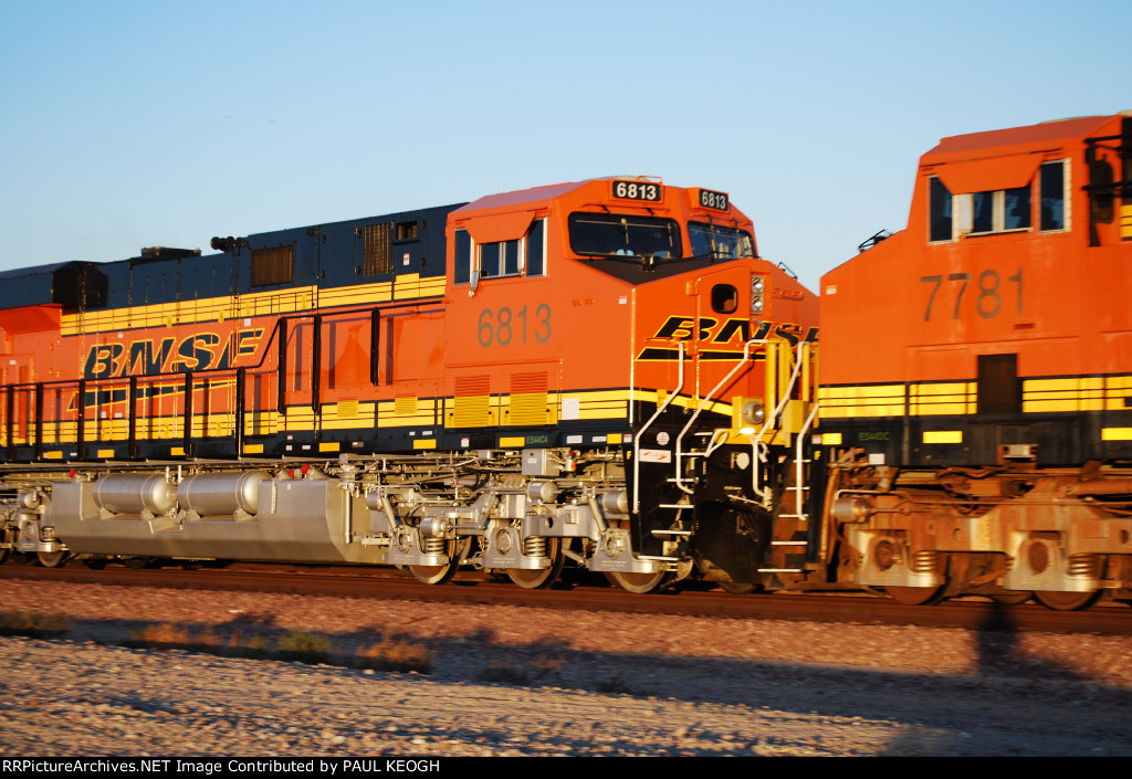 Close in shot of A Very, Very Brand New ES44C4 BNSF 6813 as she heads into the BNSF Barsow Yard ...